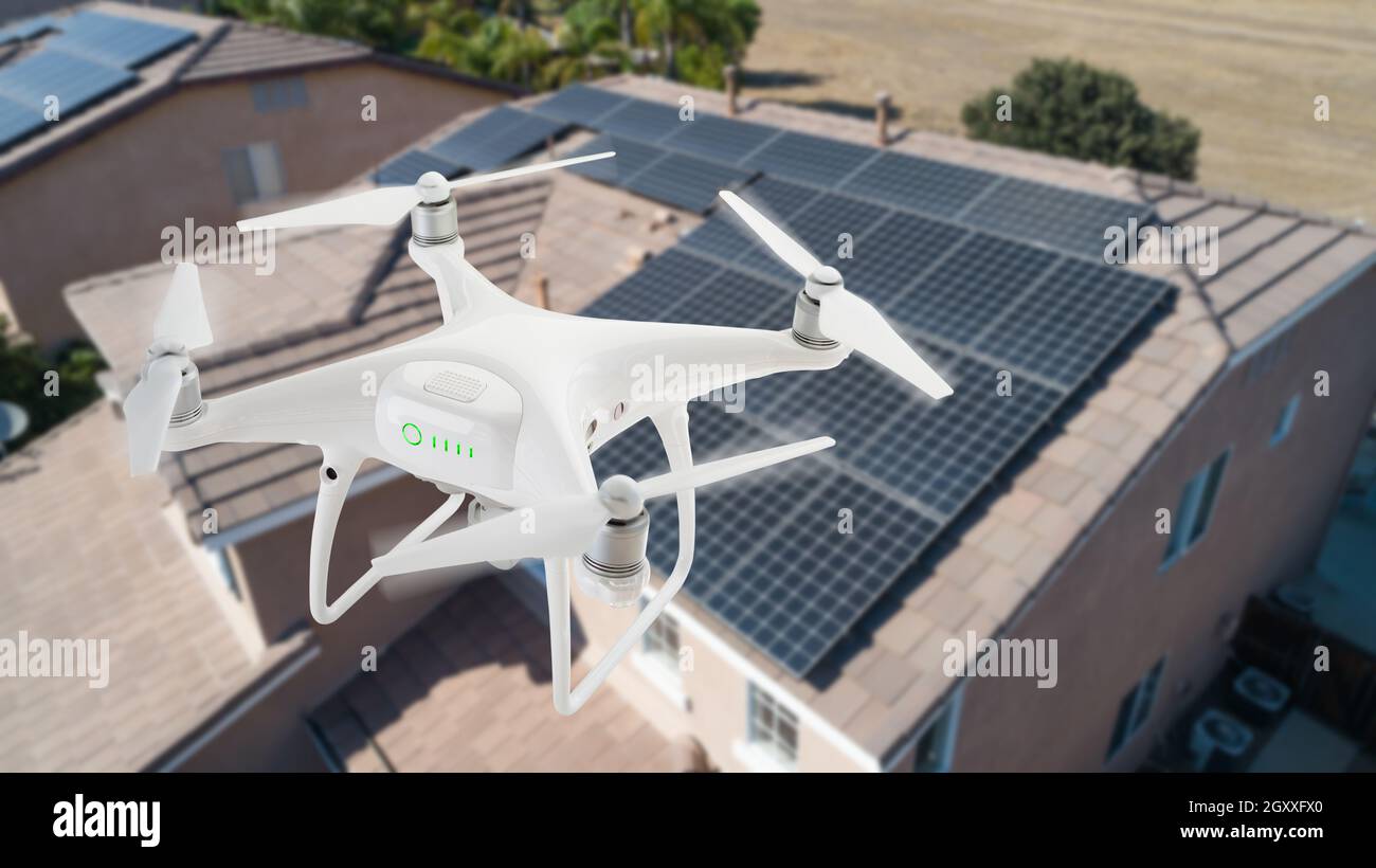 UAV Drone Inspecting Solar Panels On Large House Stock Photo - Alamy