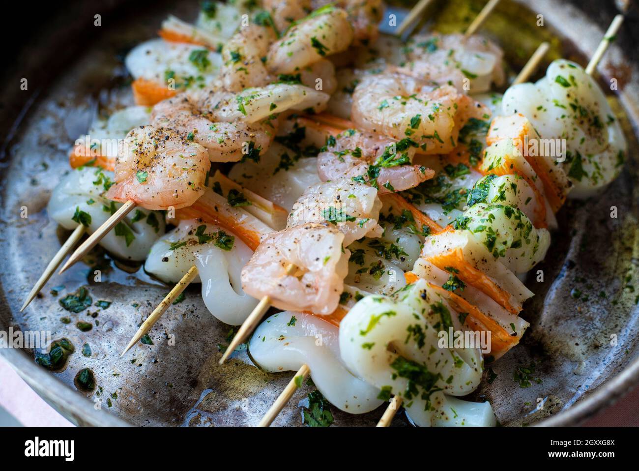 Ready to cook fish skewers with shrimp and squid Stock Photo - Alamy