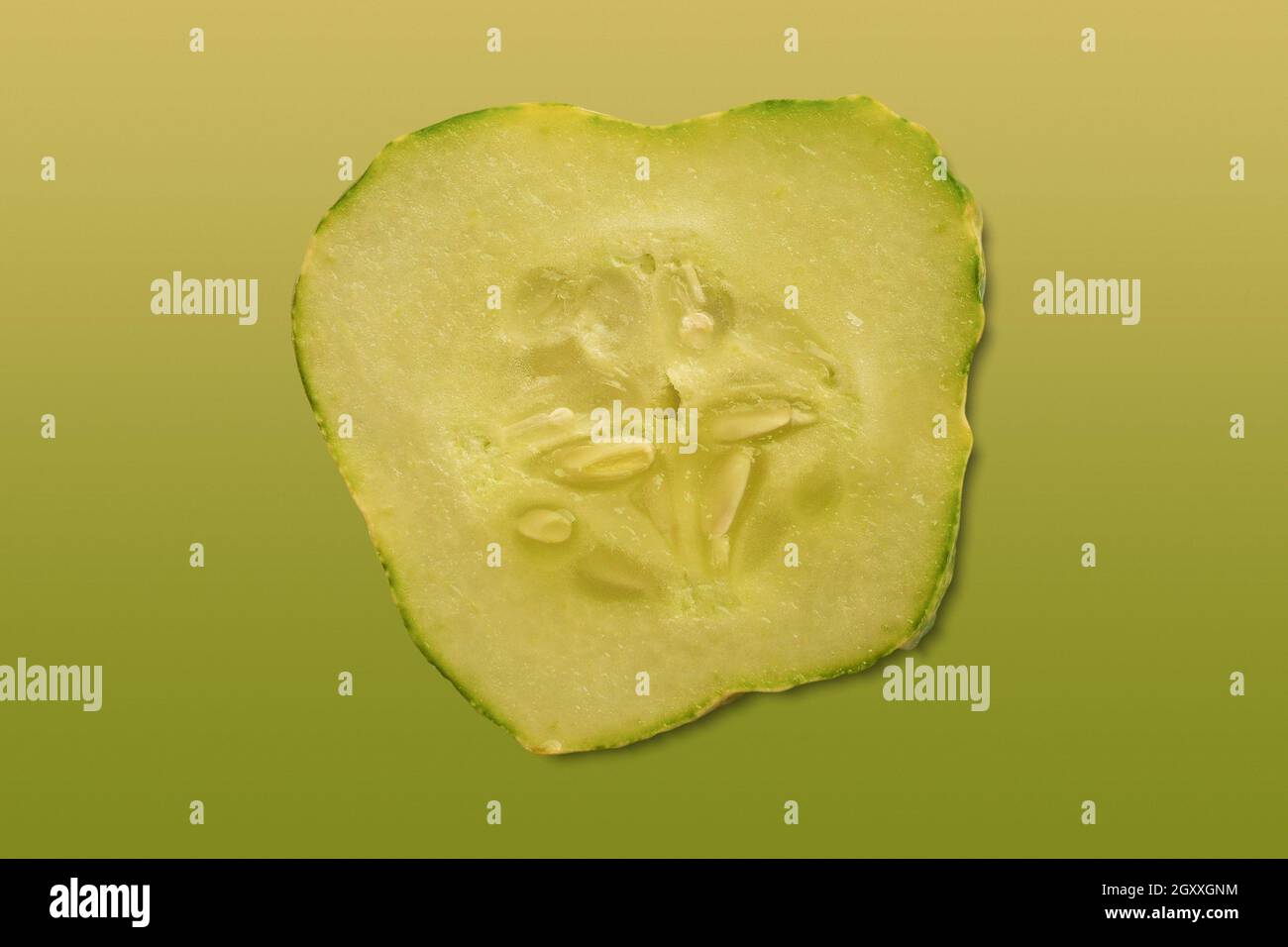 cucumber slice over matching colour gradient background Stock Photo - Alamy