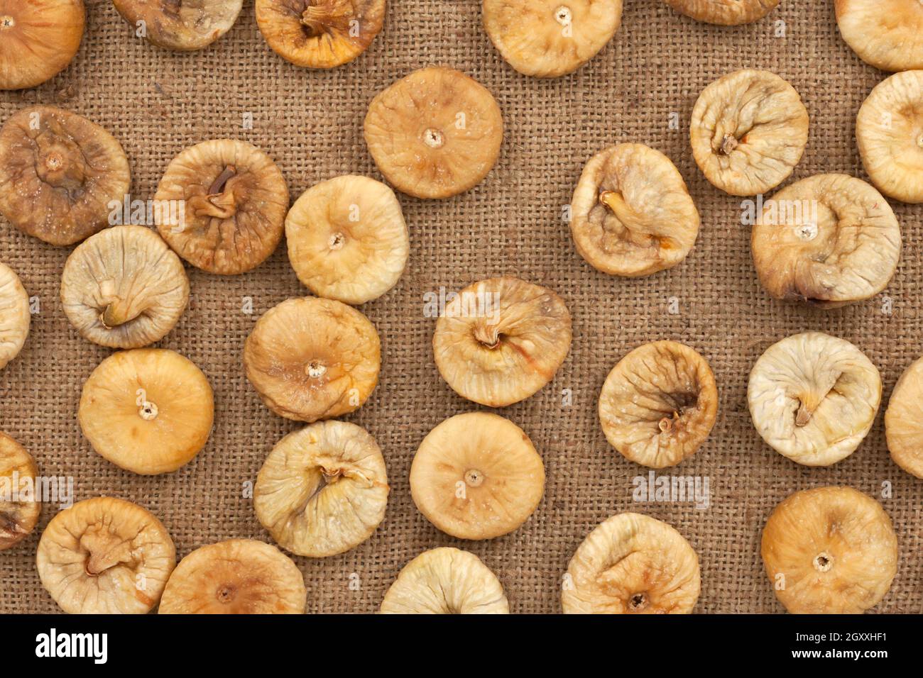 Background figs lying on sackcloth, texture Stock Photo - Alamy