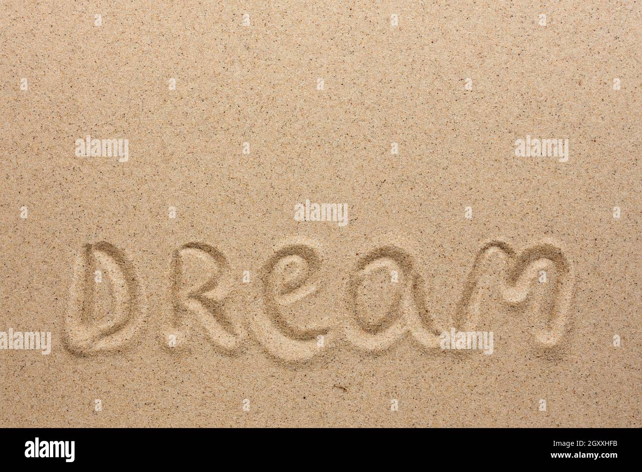 The word dream written on the sand, as the background Stock Photo - Alamy