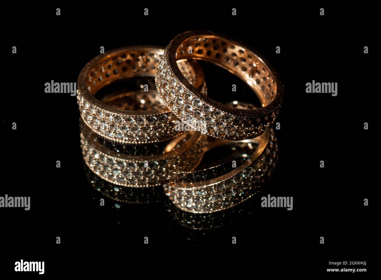 Gold wedding rings on mirror hi-res stock photography and images - Alamy