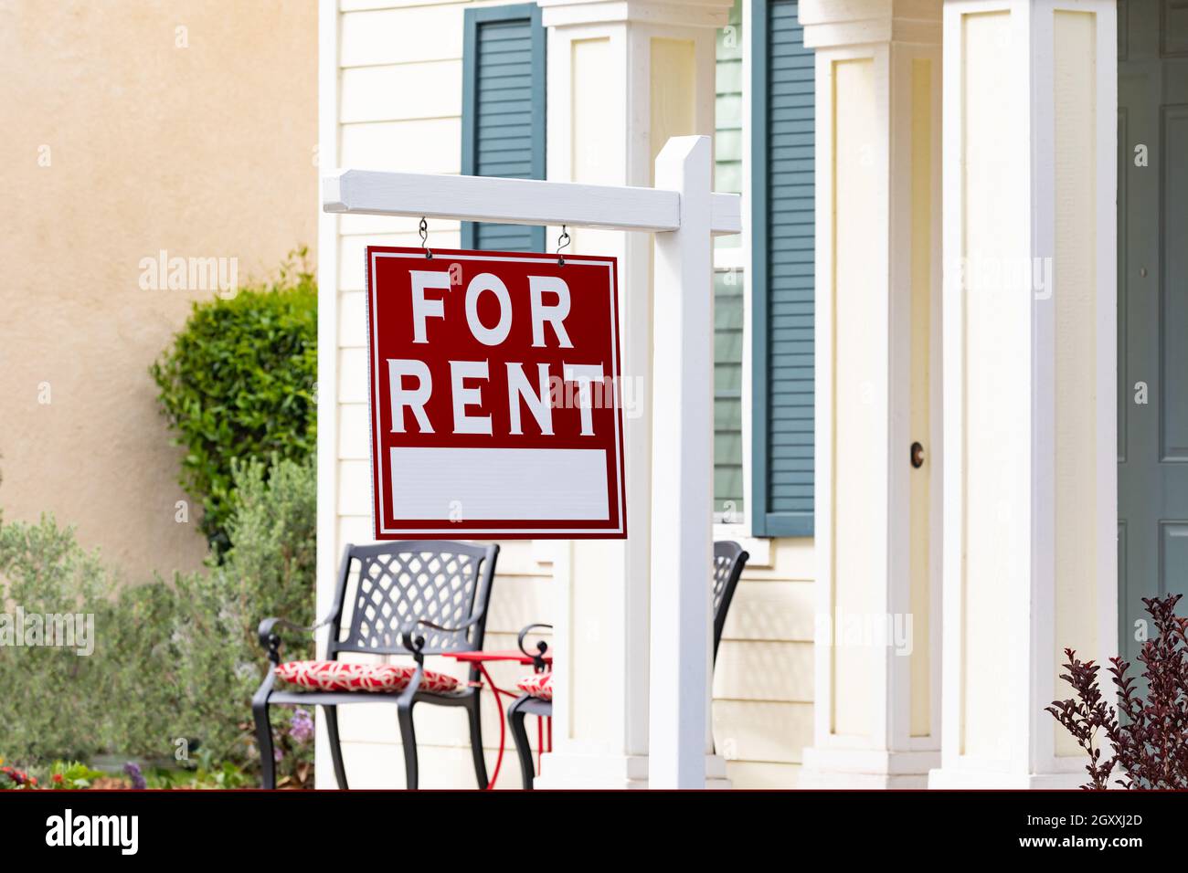 Red For Rent Real Estate Sign in Front House Stock Photo - Alamy