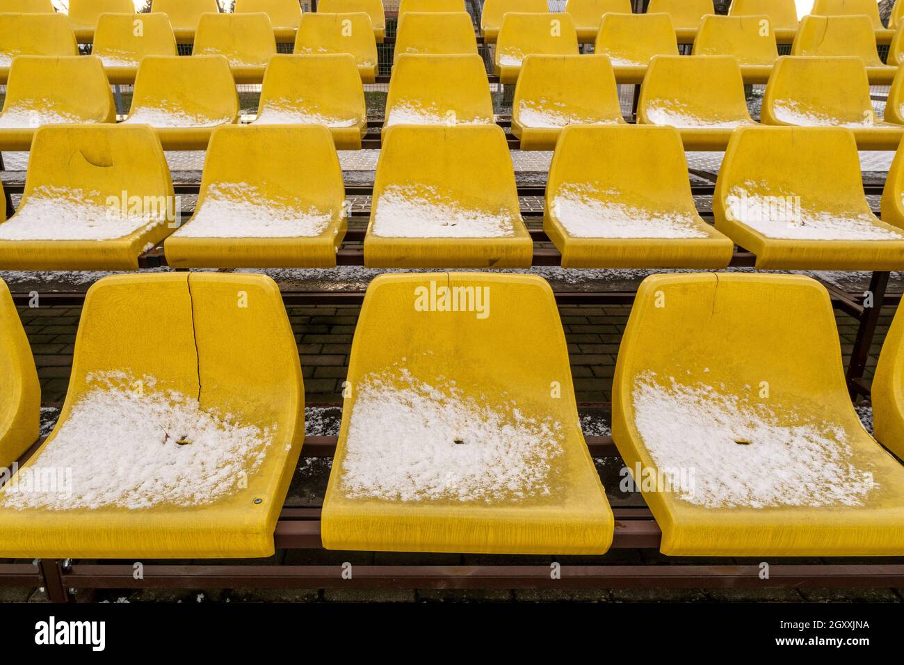 Empty Football (Soccer) Stadium Seats in the Winter Covered in Snow ...