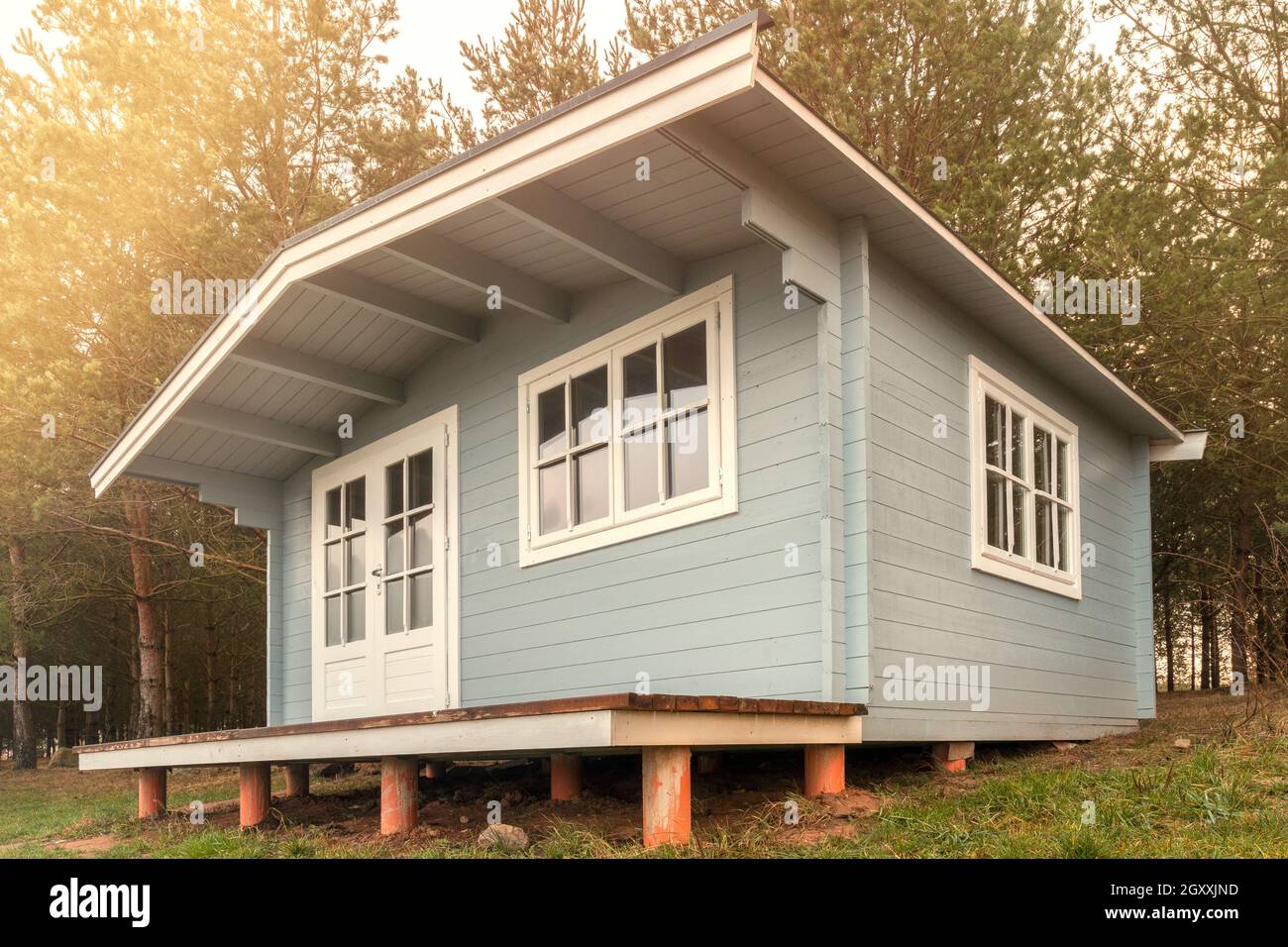 Wooden house in countryside. Ecological Small wooden house. Beautiful ...