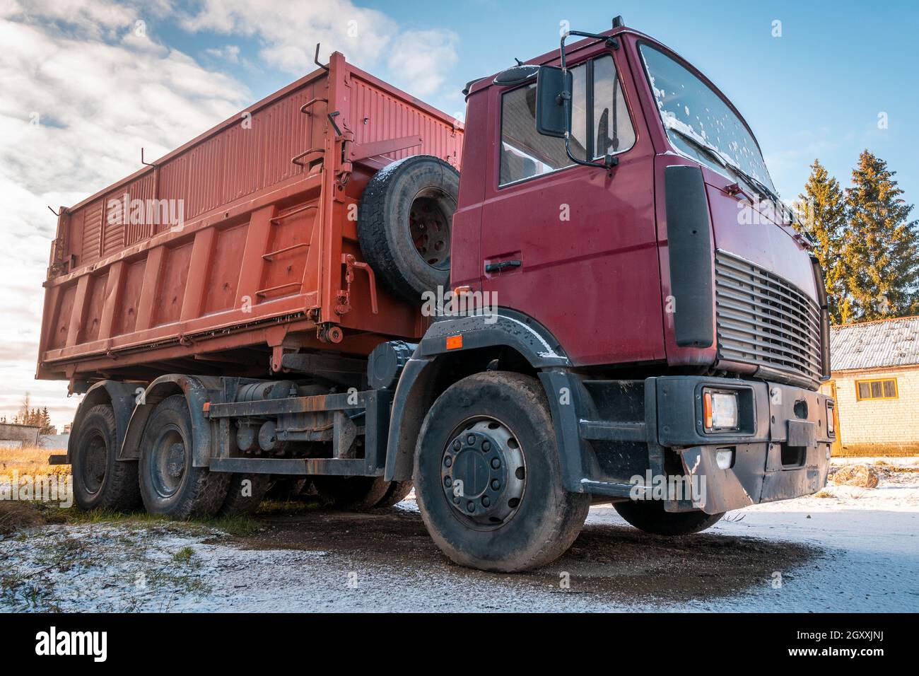 Big dump truck standing on the construction site Stock Photo - Alamy