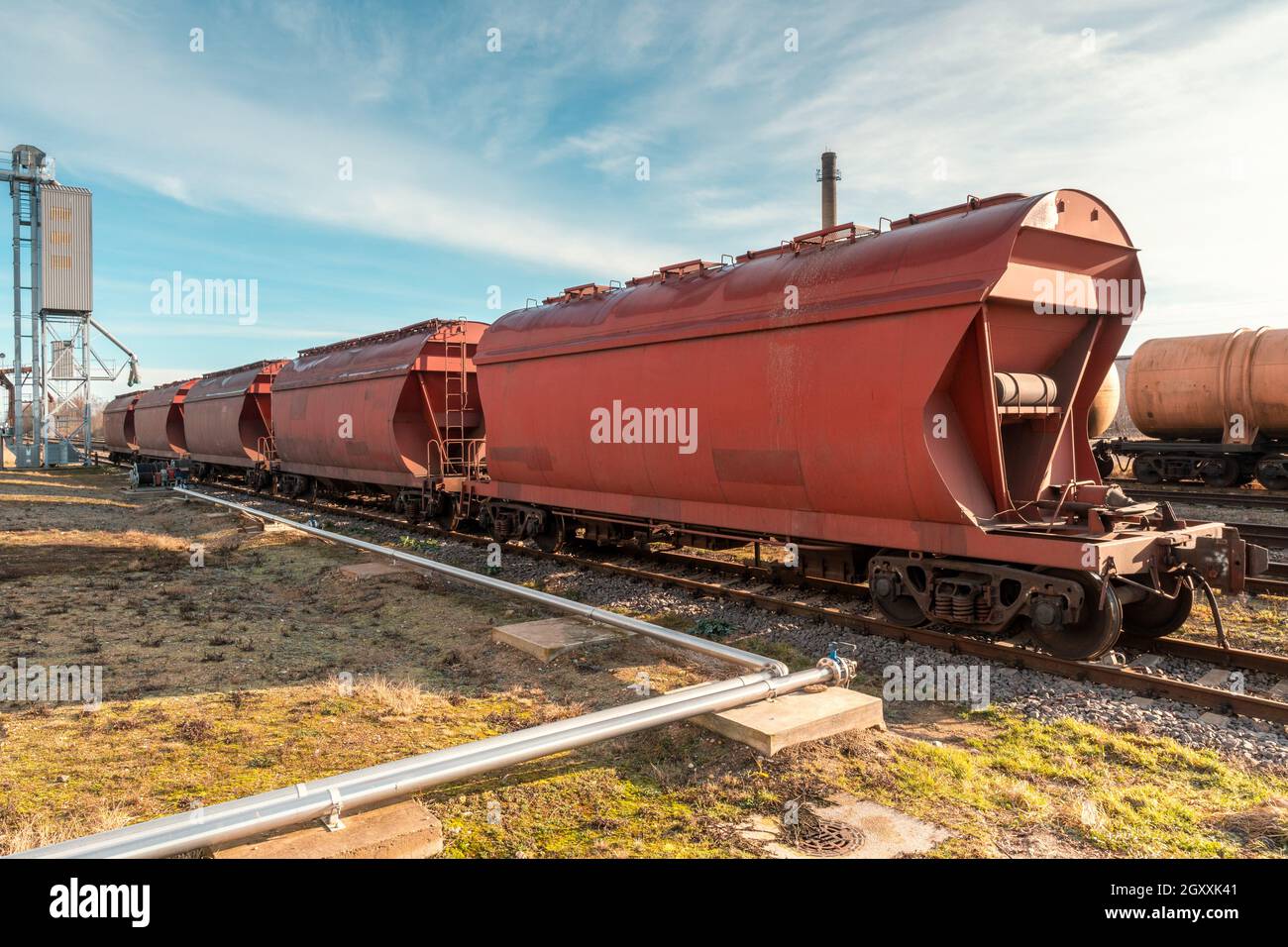 The train stands for the issuance of grain near the elevator.Rail cars ...