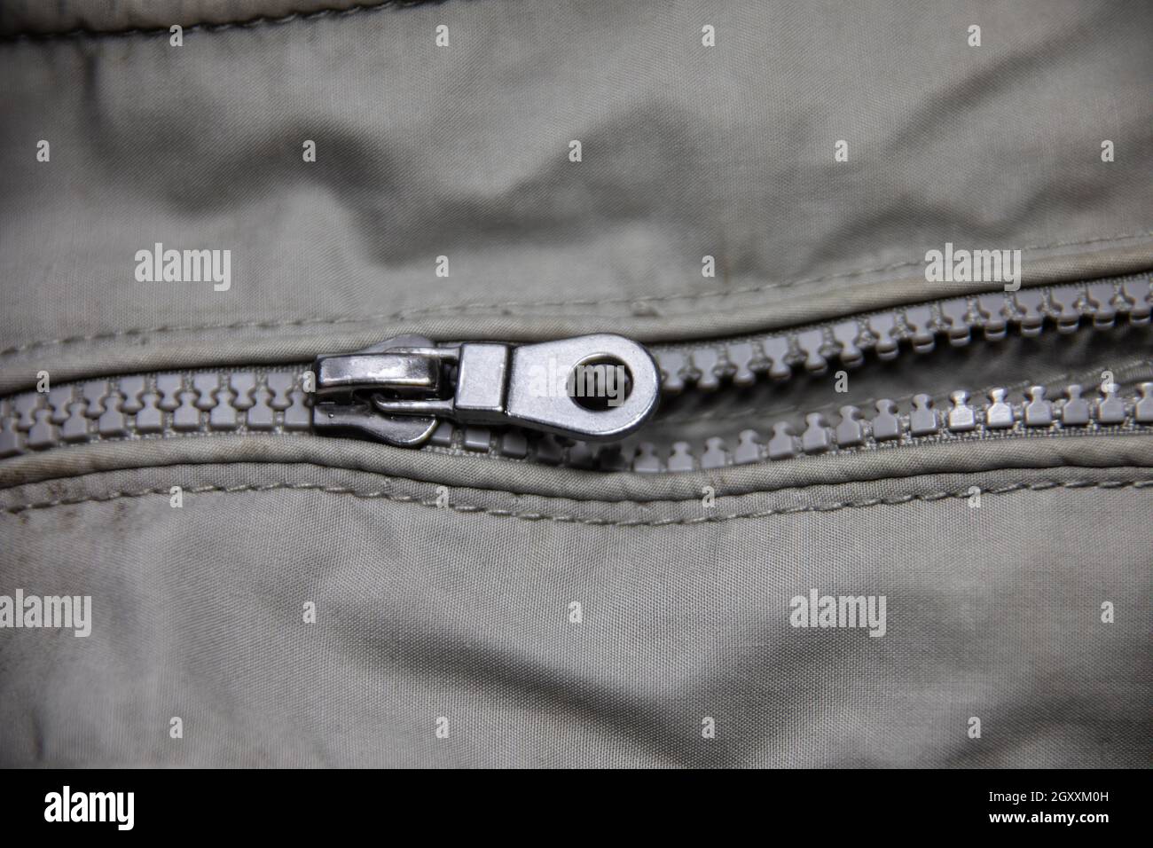light gray jacket with zipper Stock Photo - Alamy