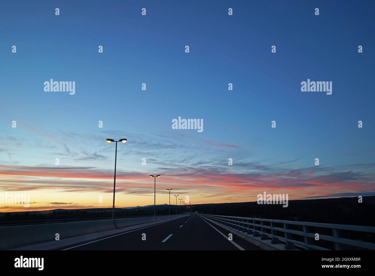 Beautiful roadside landscape scenery with mountain range and clear blue ...