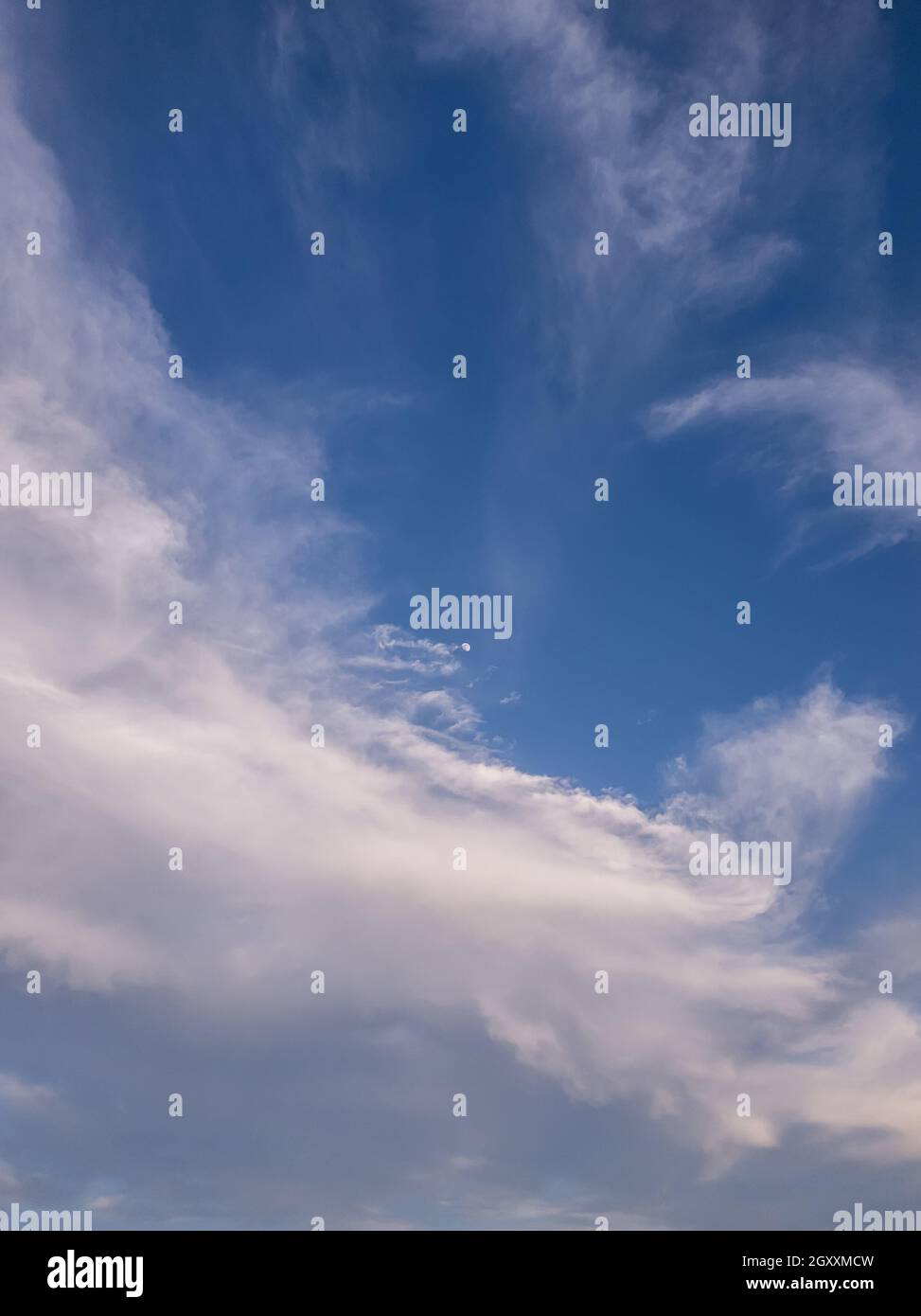 Panoramic cloudscape scene over the blue sky. Fluffy white clouds ...