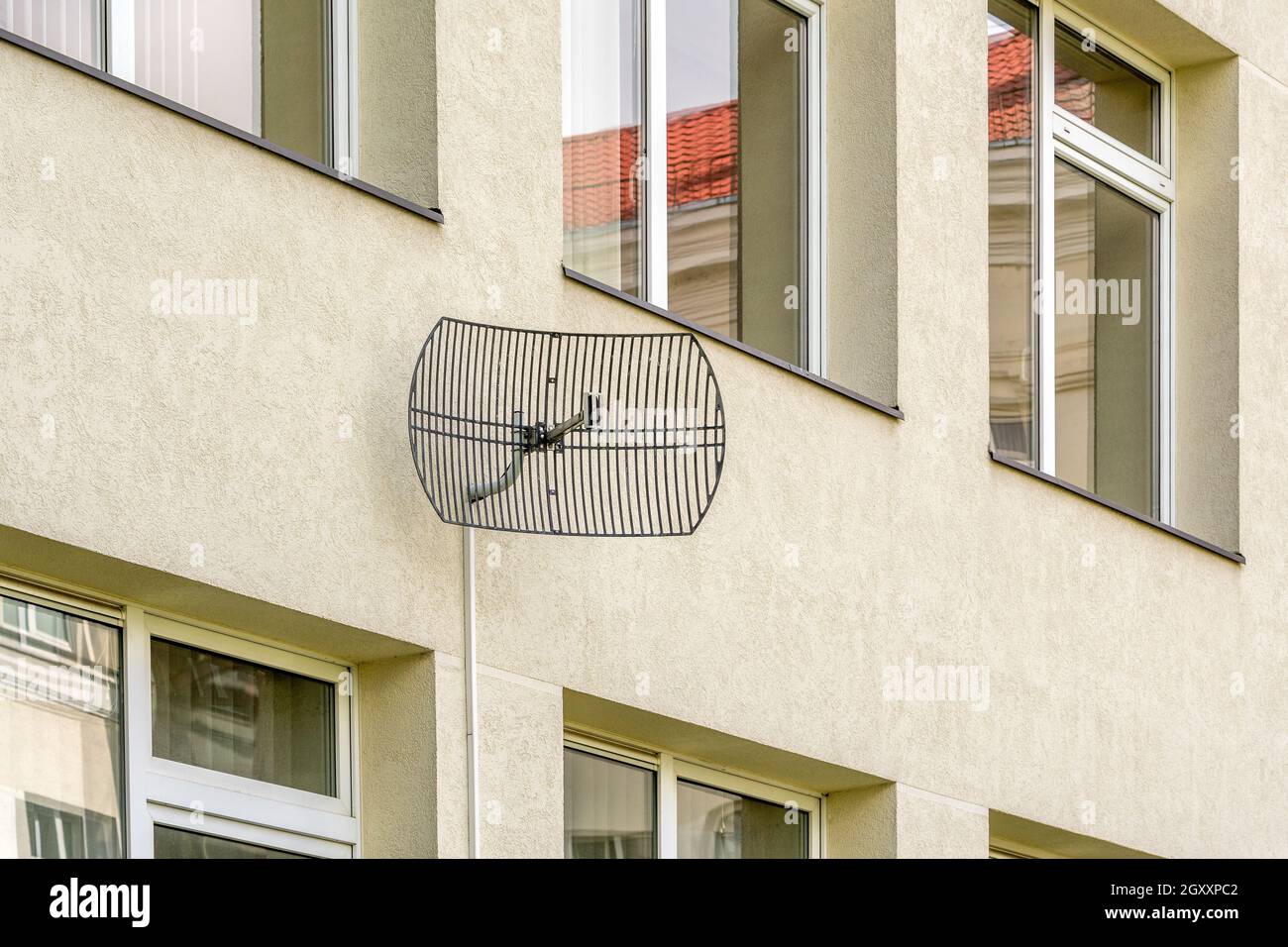 Hause facade with windows and wireless access point antenna Stock Photo ...