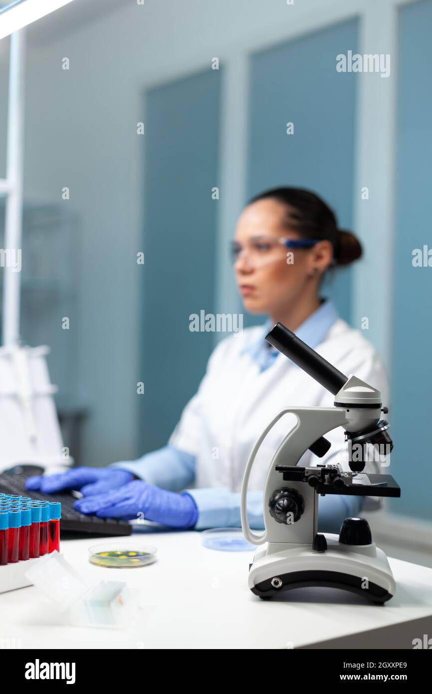 Selectiv focus on medical microscope standing on table in biochemistry ...