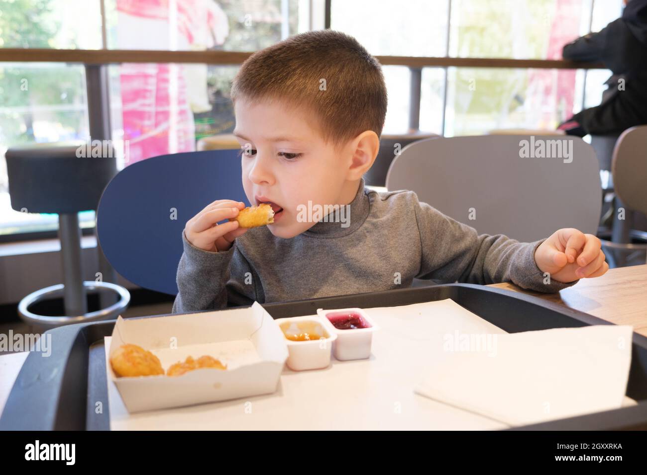 Boy chicken nugget hi-res stock photography and images - Alamy