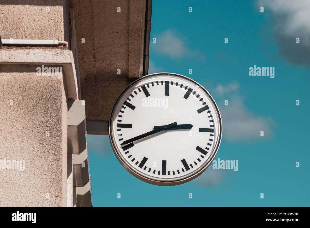 Large clock on the outside of a building. The time is 2:40 AM Stock ...