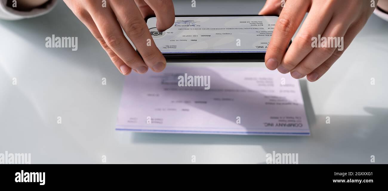 Remote Payroll Cheque Deposit Taking Picture Using Phone Stock Photo ...