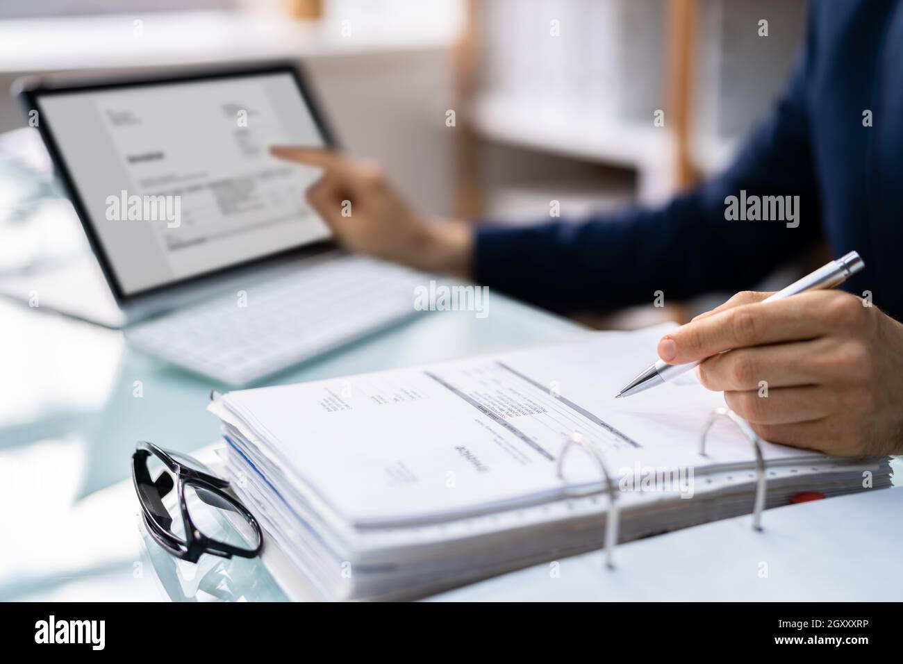 Accountant Calculating E Invoice Tax Bill And Receipt Stock Photo - Alamy