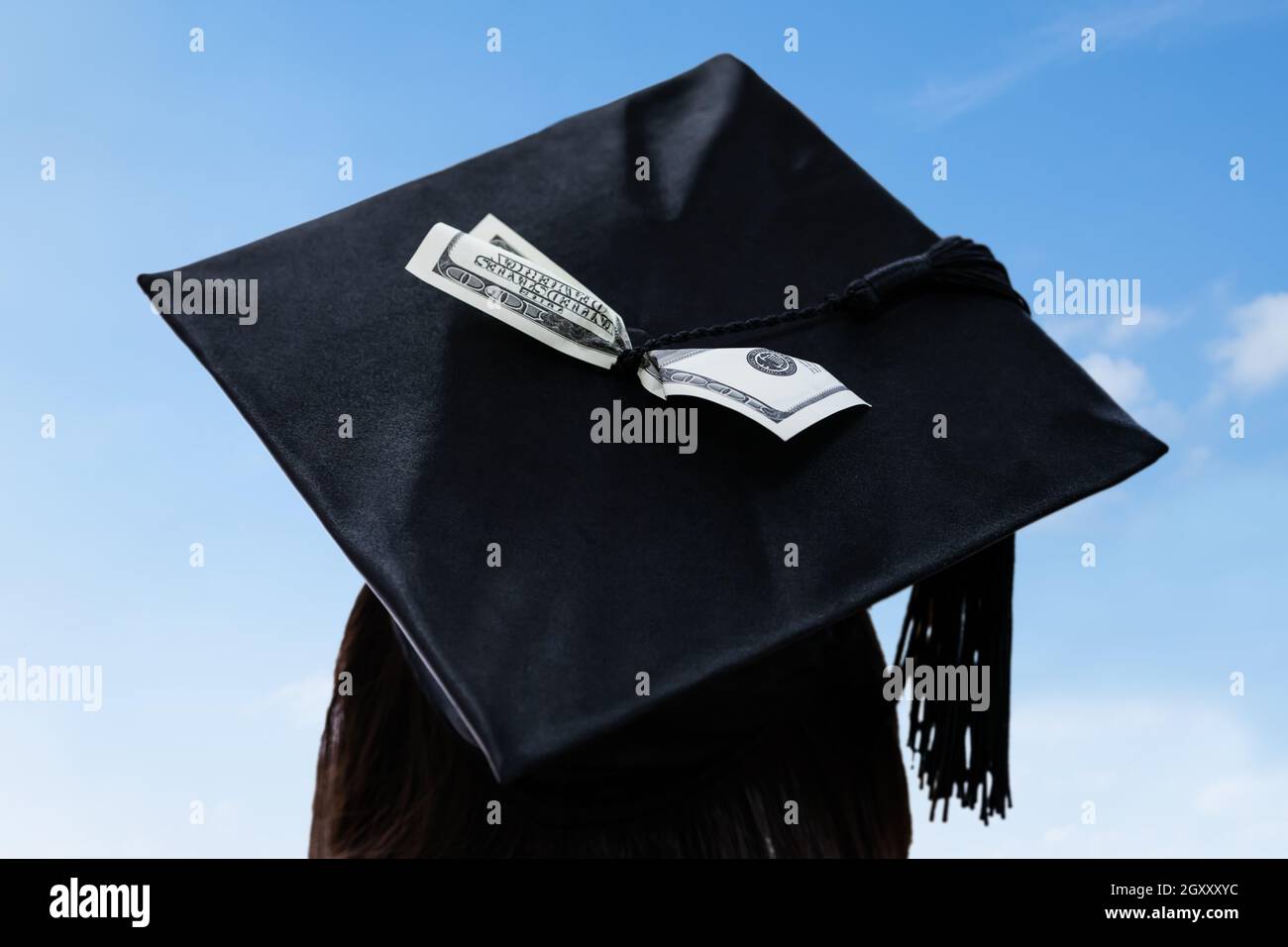 Education Money And Study Cost. Saving Graduate Fee Stock Photo - Alamy