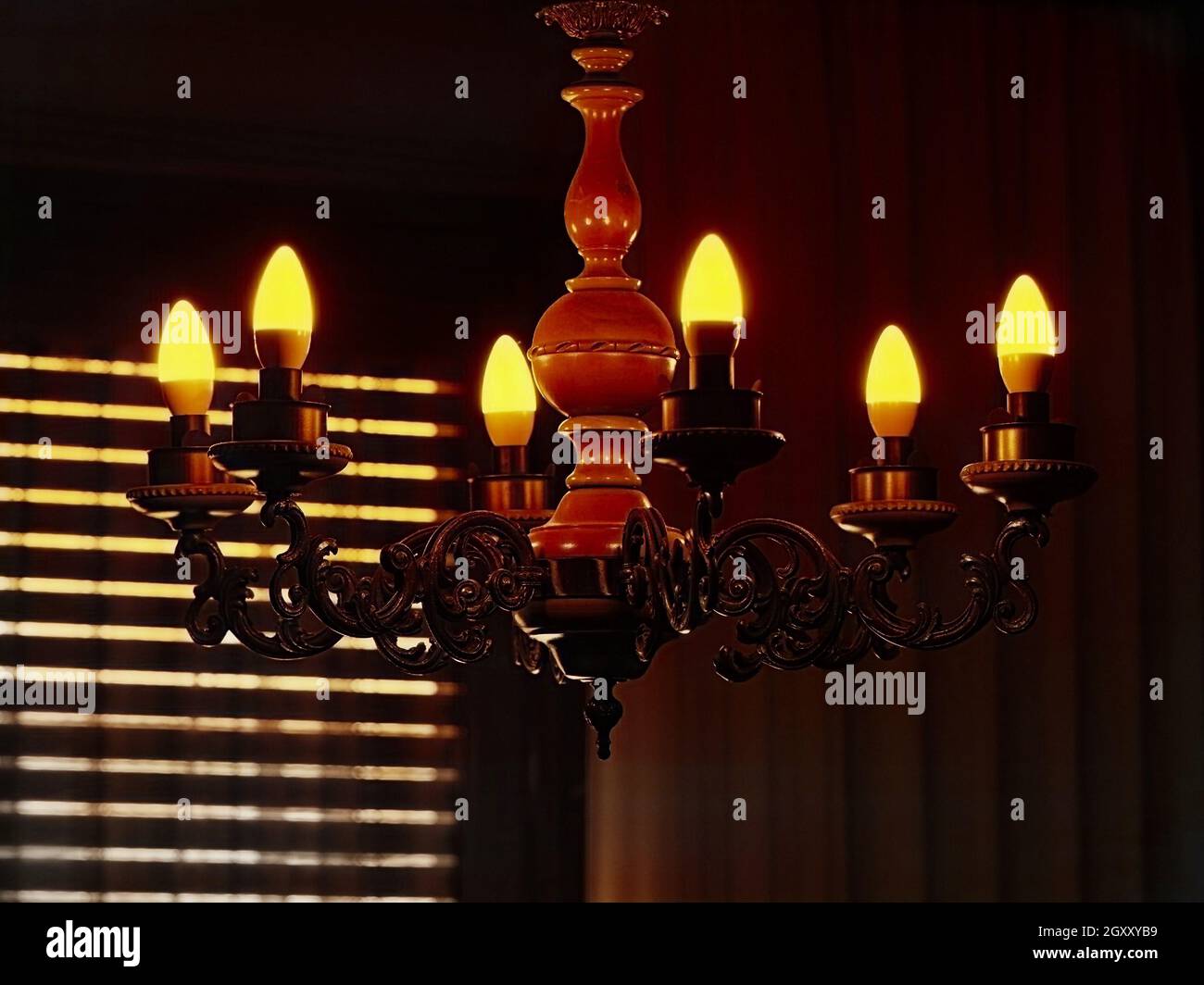 Ancient chandelier retrofitted with modern LED lamps Stock Photo - Alamy