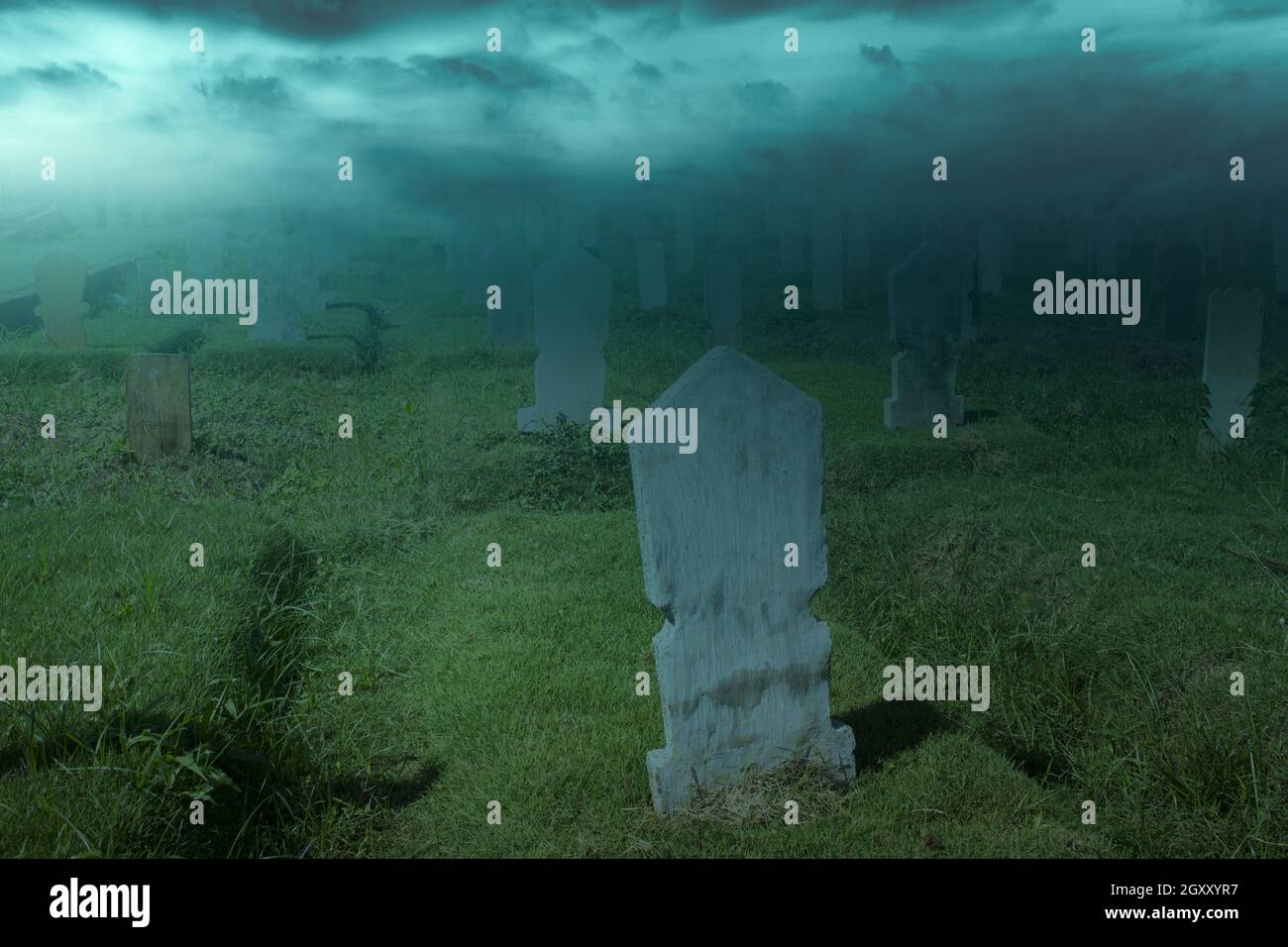 Tombstones on the graveyard with night scene background. Halloween ...