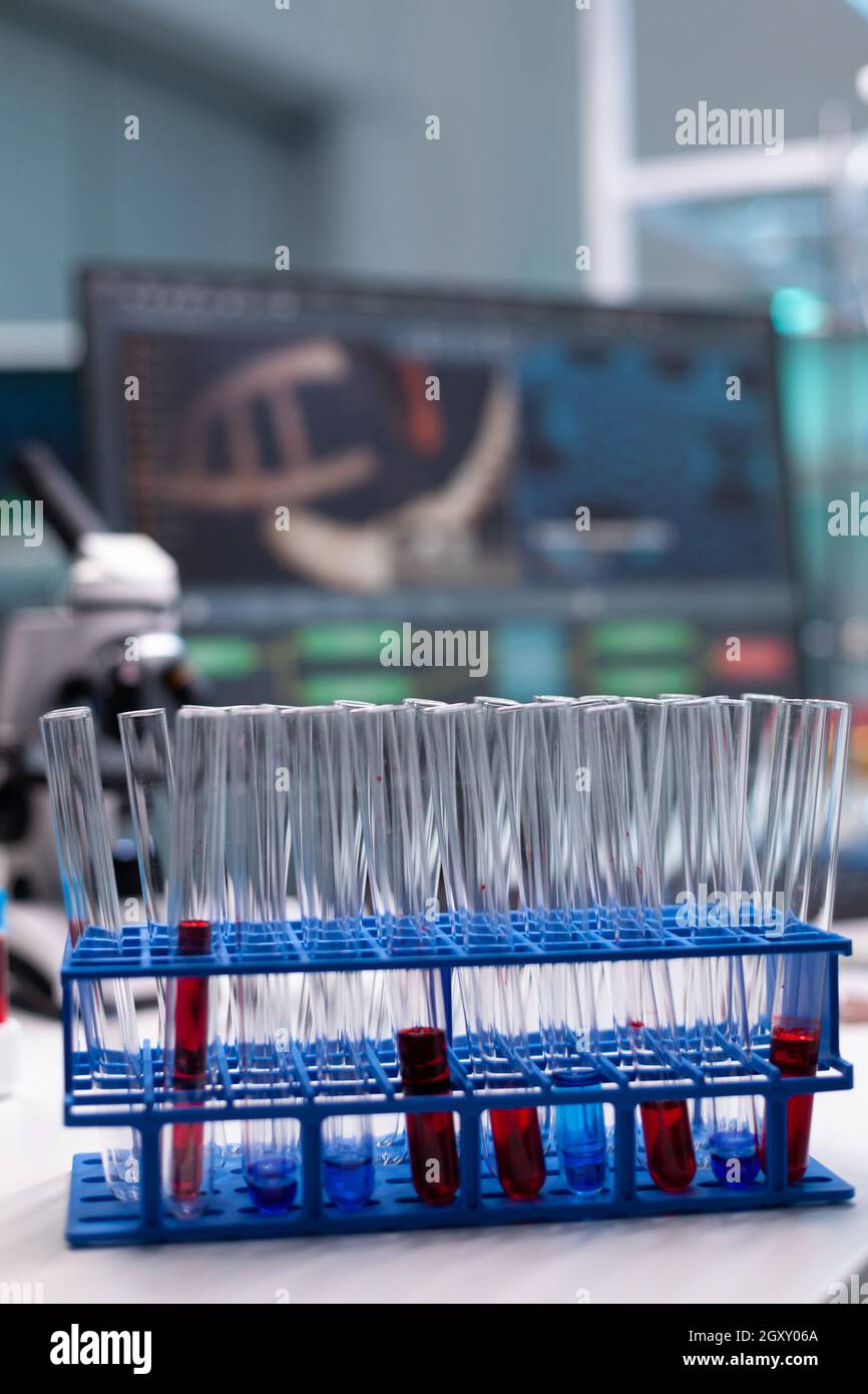 Close up of tube rack with test tubes on laboratory desk. Transparent ...