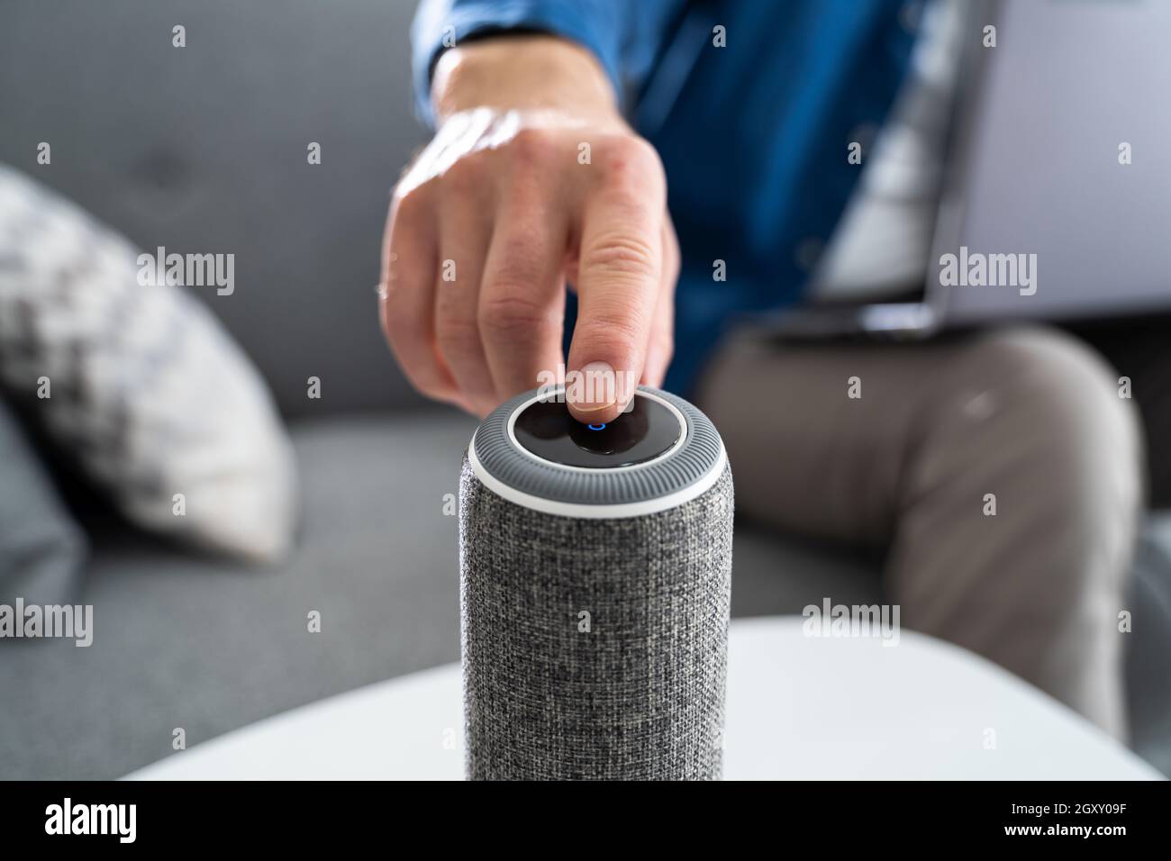 Using Smart Voice Assistant Wireless Mini Speaker Stock Photo - Alamy