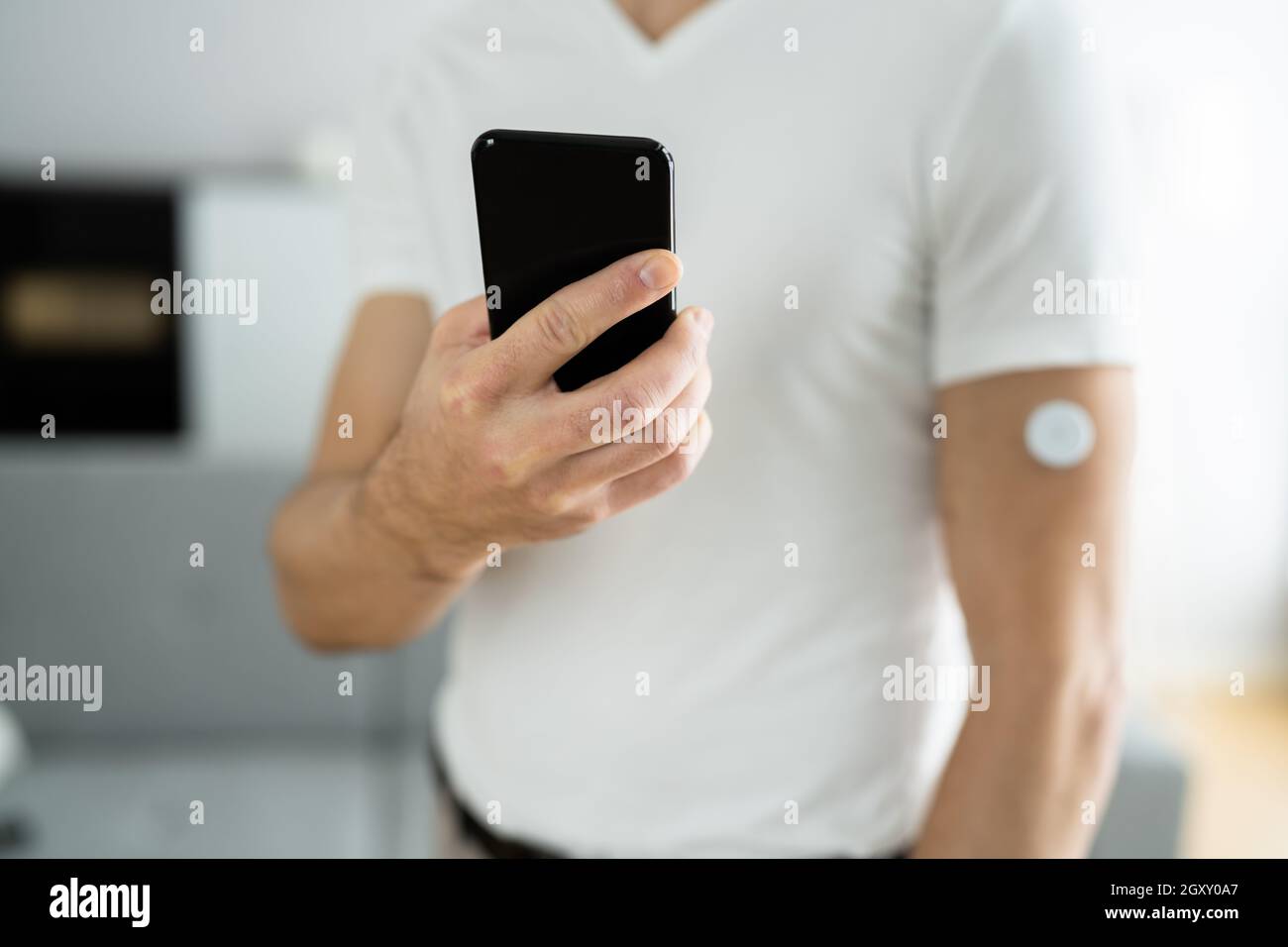 Continuous blood glucose monitor phone hi-res stock photography and ...