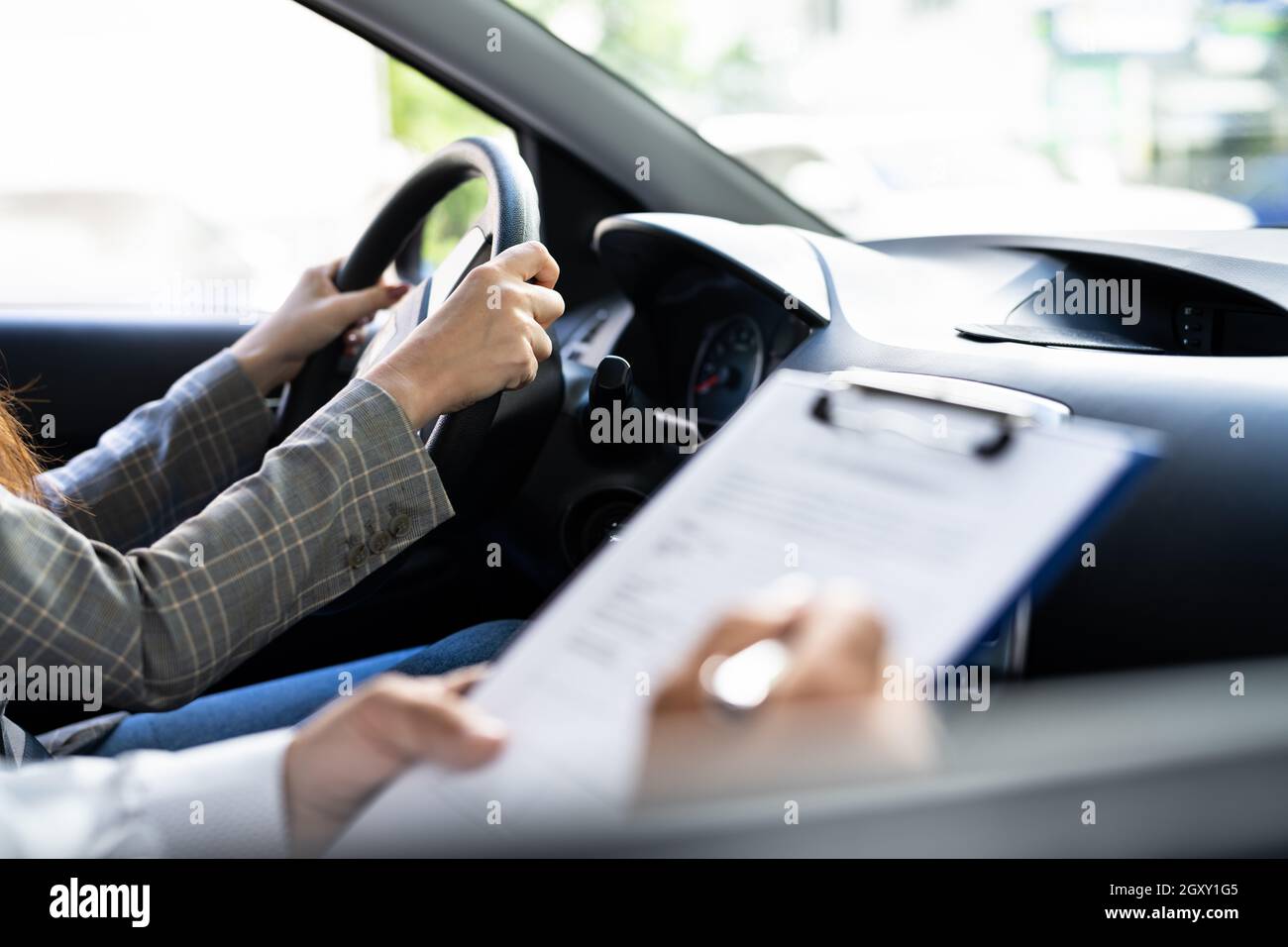 Driving License Lesson Or Test With Instructor Stock Photo - Alamy