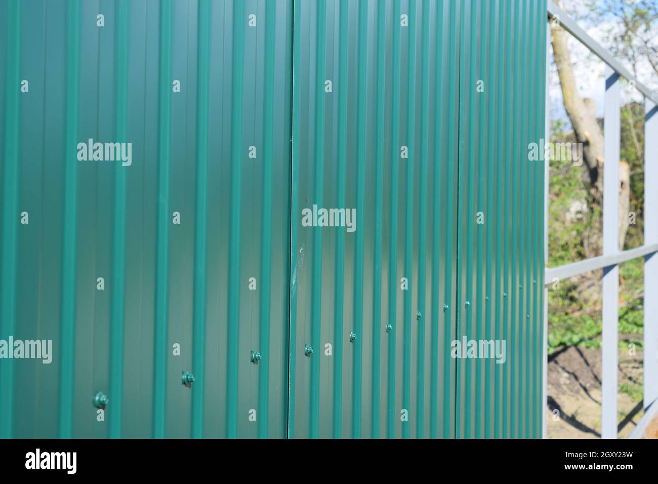 Diagonal pattern of metal profile. Fences from the galvanized iron ...