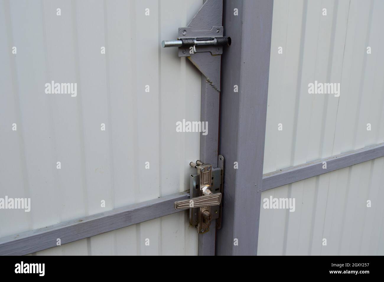 Latch on gate and the lock with the handle. A design for locking of ...
