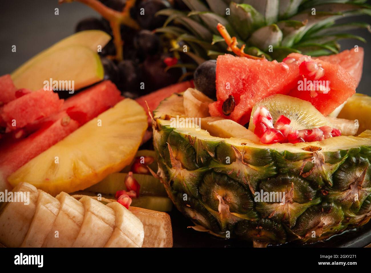 Fresh Fruit mix plate closeup Stock Photo - Alamy