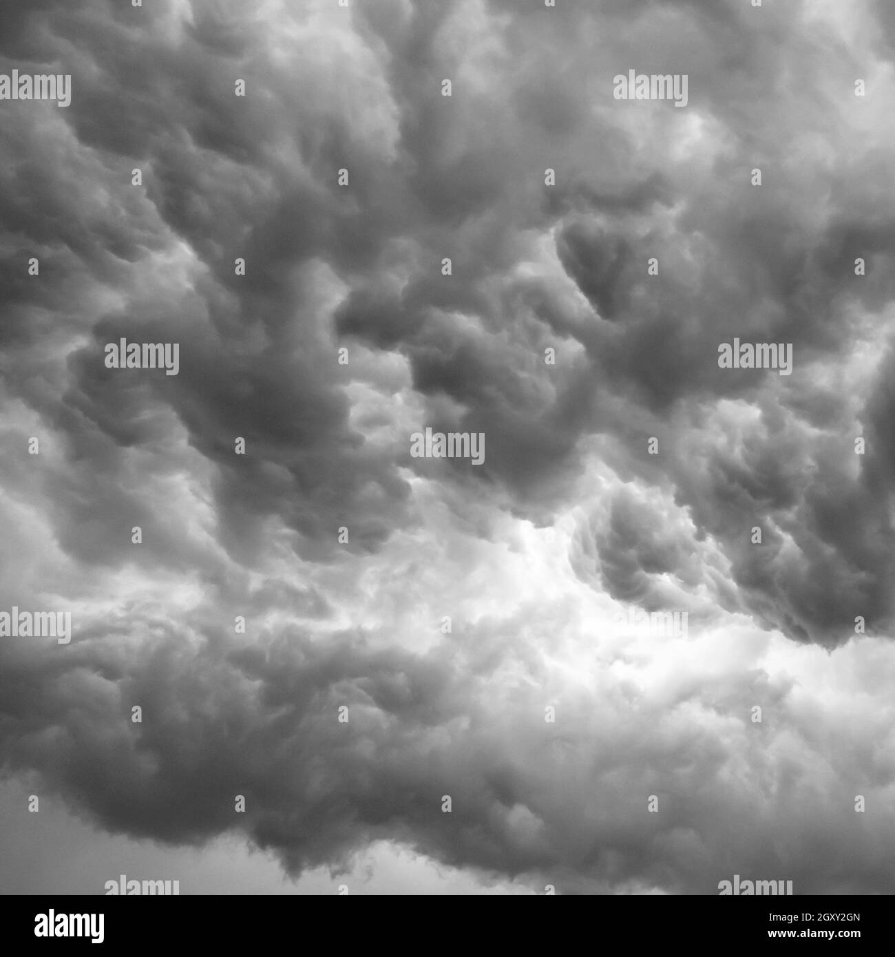 Rainy cloudy sky background. Dark ominous grey storm clouds. Dramatic ...