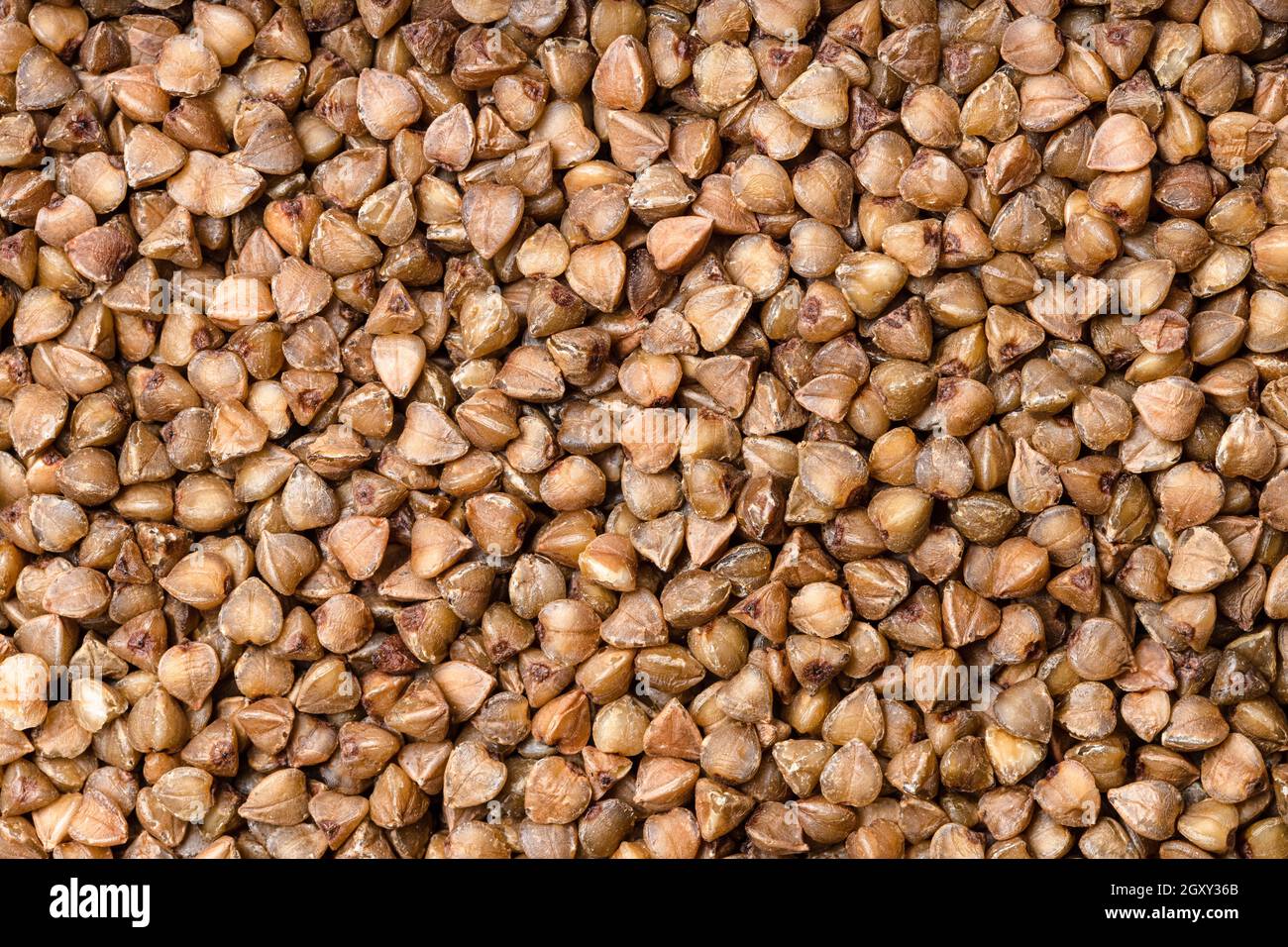 food background - roasted buckwheat grains Stock Photo - Alamy