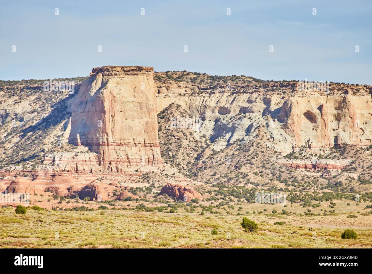 Landscape of desert cliff mountains by open field Stock Photo - Alamy