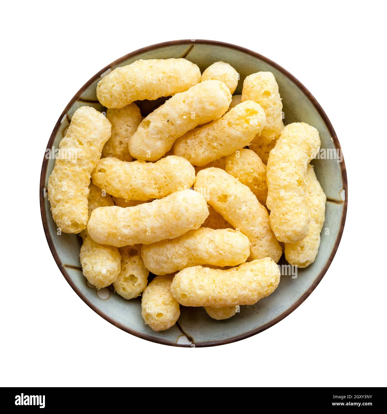 top view of corn puffs in ceramic bowl isolated on white background ...