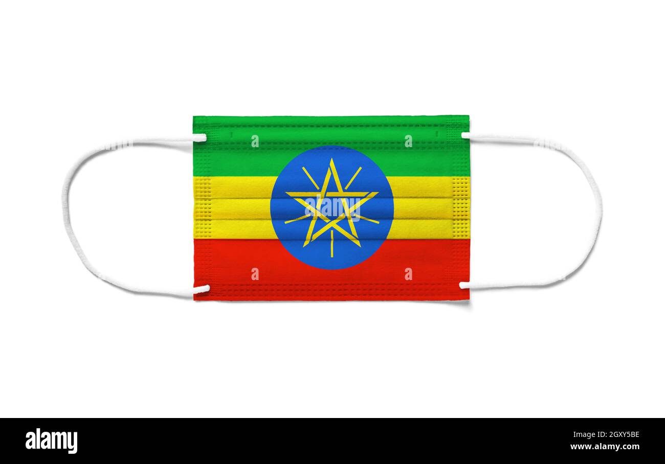 Flag of Ethiopia on a disposable surgical mask. White background ...