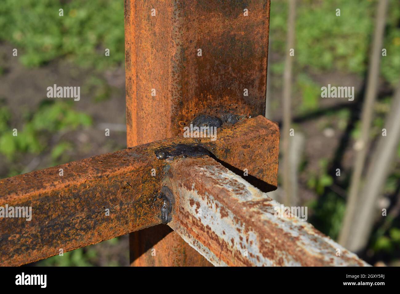 Spot weld. Mounting frame fence from metal sheets Stock Photo - Alamy