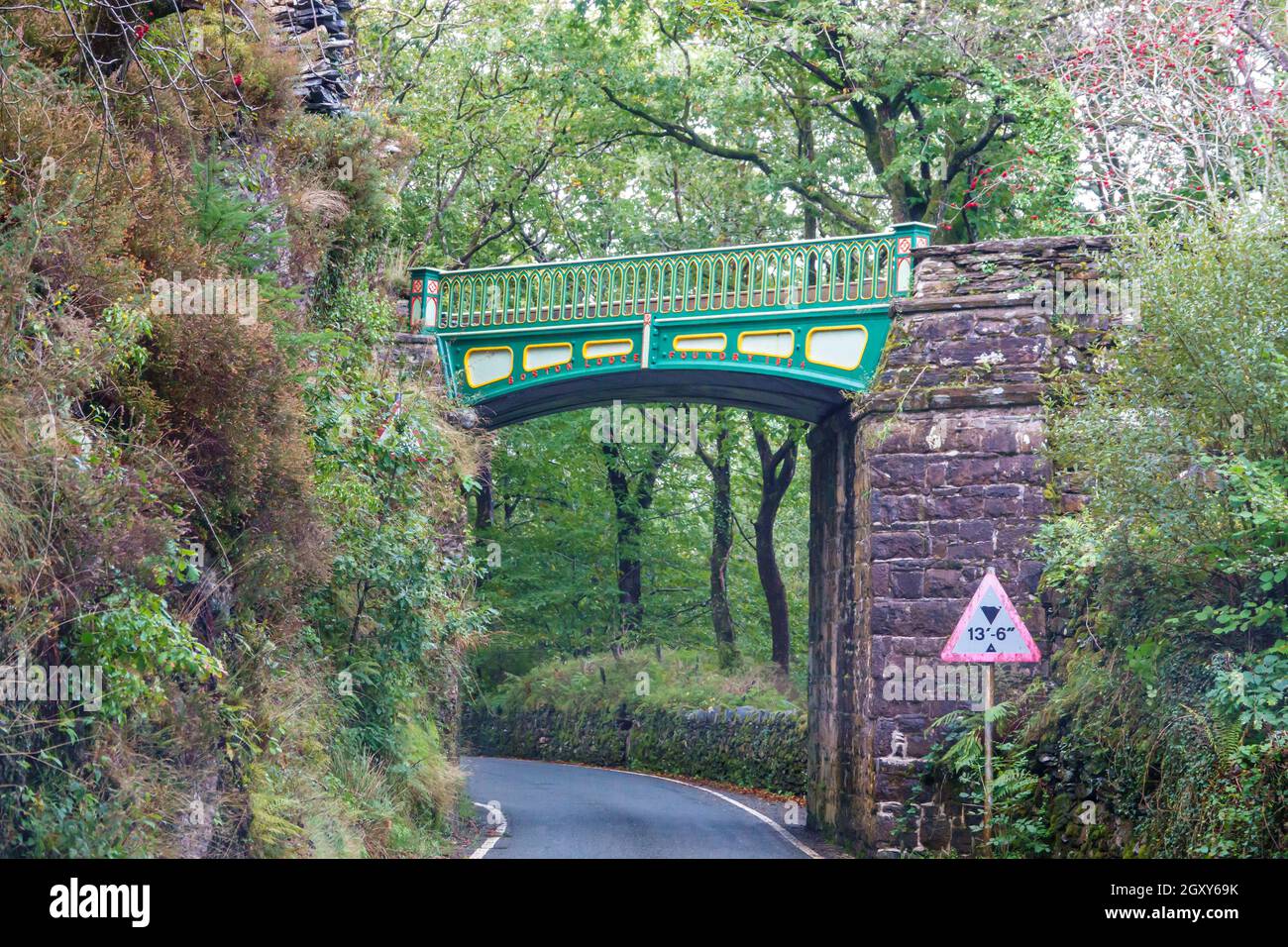 painted bridge on an historical narrow gauge railway in Wales UK Stock ...