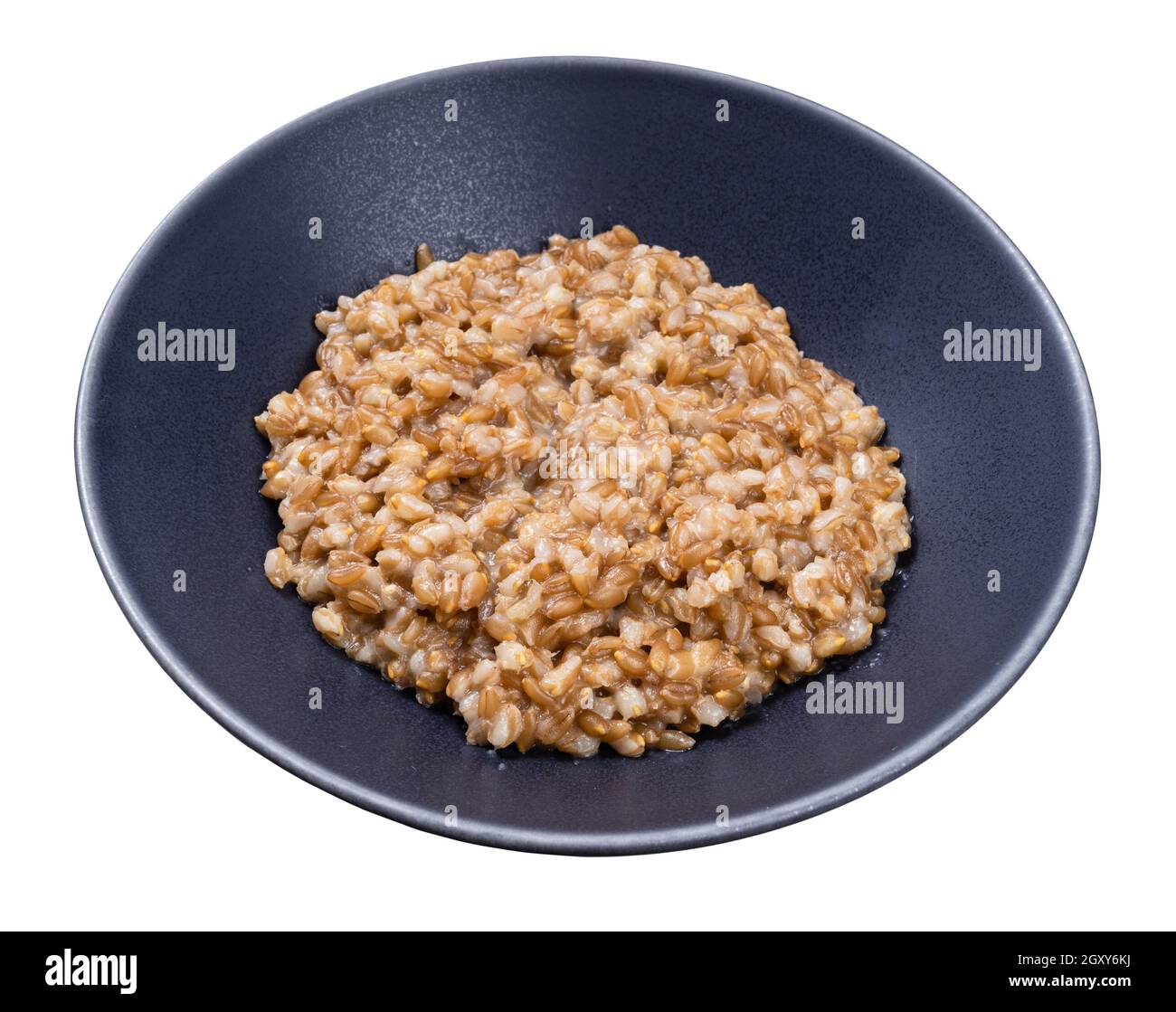 porridge from whole-grain Emmer farro in gray bowl isolated on white ...
