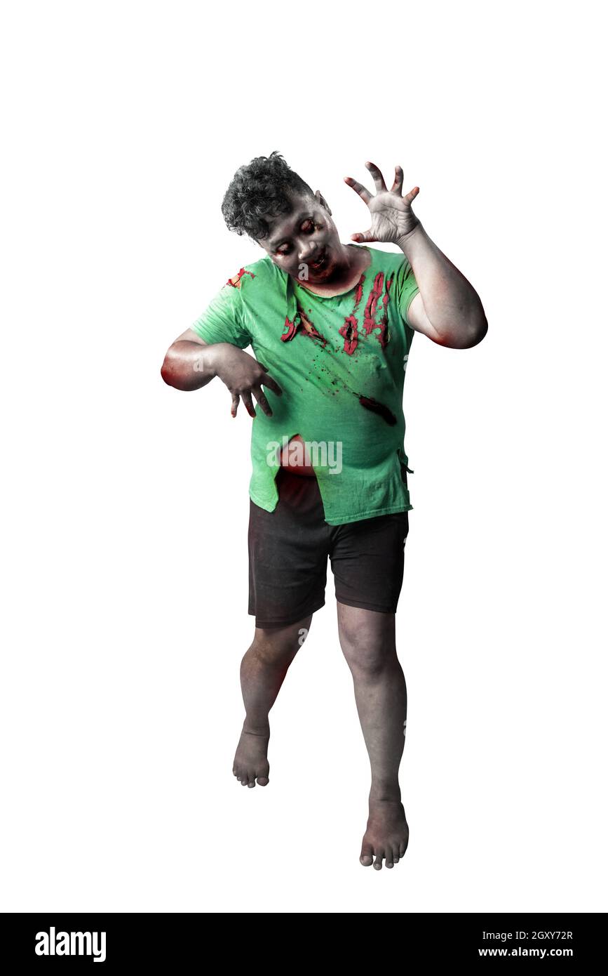 Scary zombie with blood and wound on his body standing isolated over ...