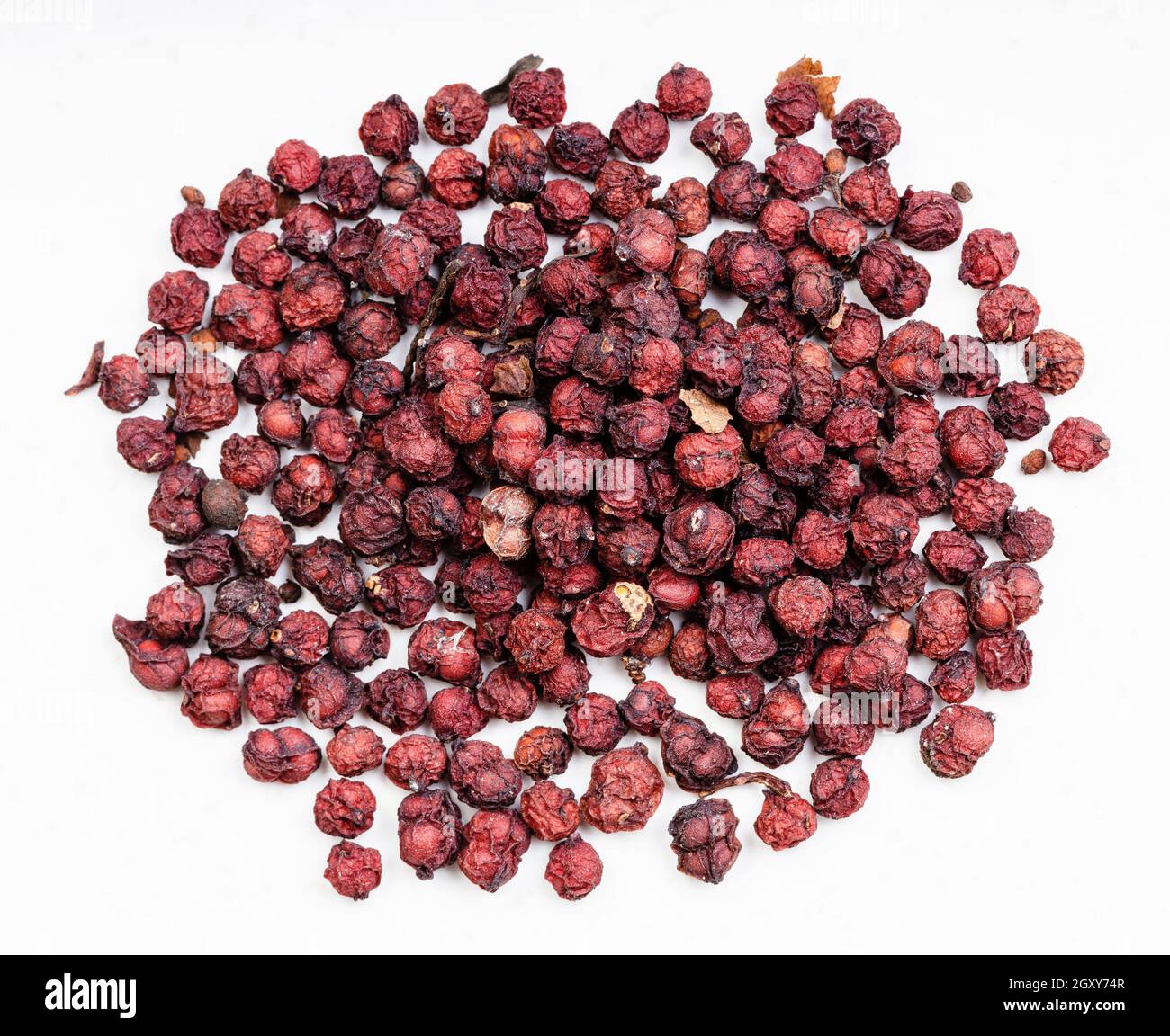 top view of pile of dried magnolia berries (Schisandra chinensis fruits ...