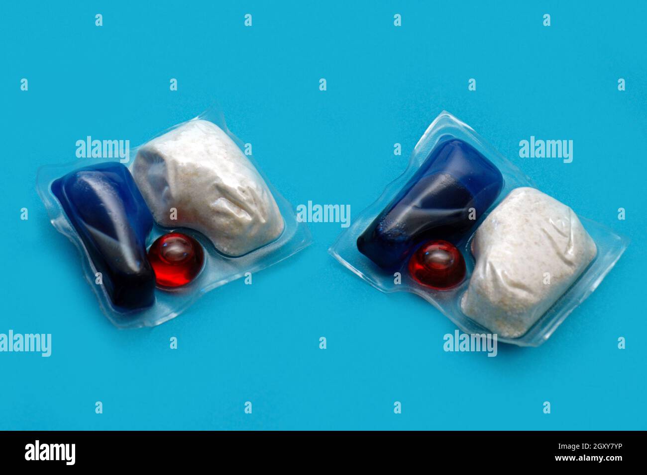 Blue pods used for domestic household machine appliance for washing ...