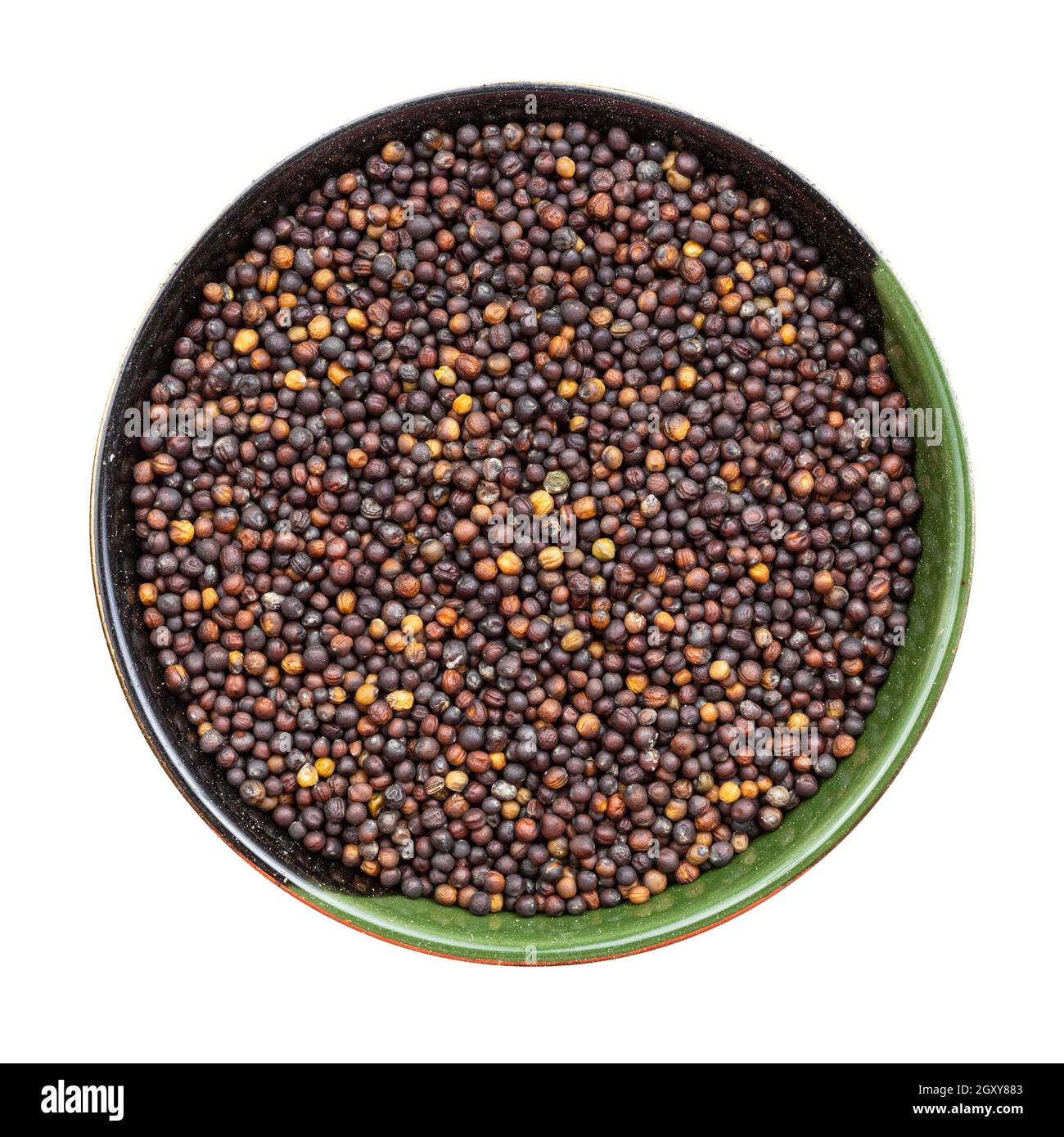 top view of whole-grain rapeseeds in round bowl isolated on white ...