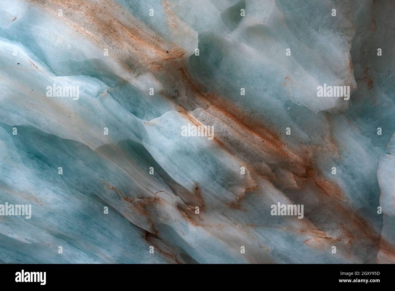 the texture of the blue ice of a mountain glacier Stock Photo - Alamy