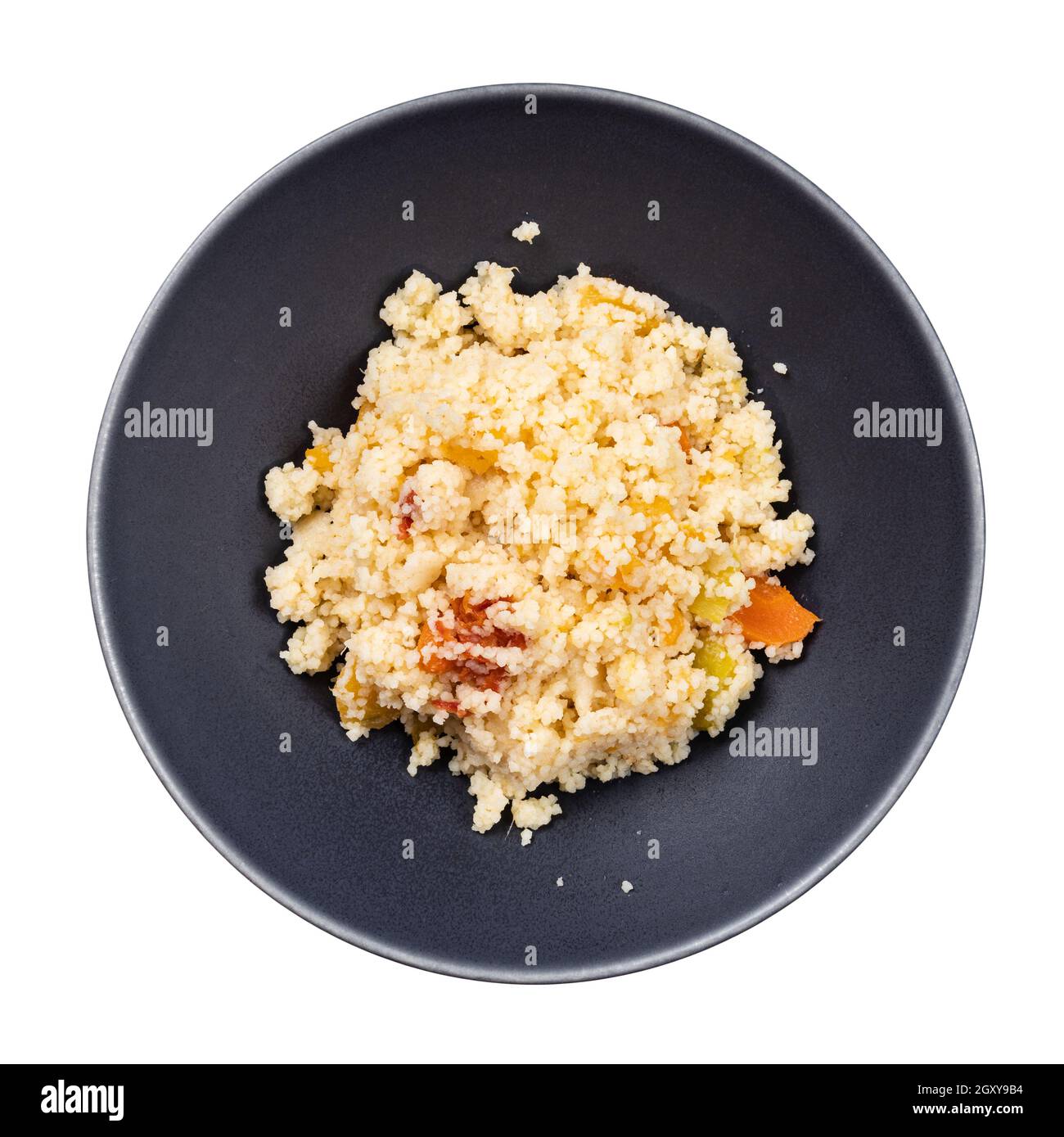 top view of moroccan couscous cooked with vegetables in gray bowl ...