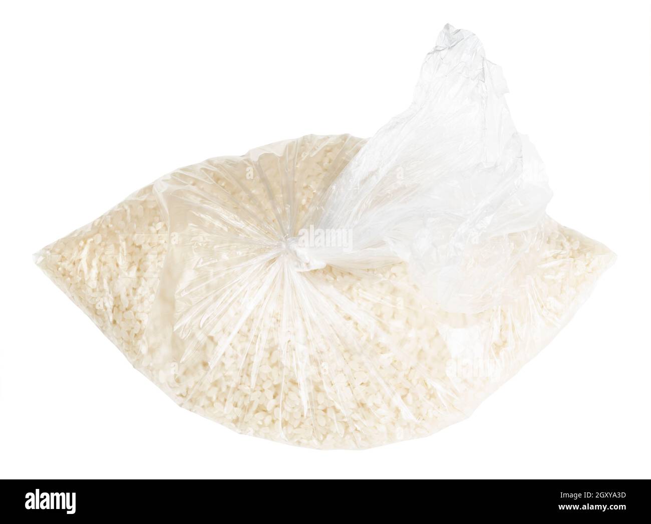 raw white rice in knotted plastic bag isolated on white background ...