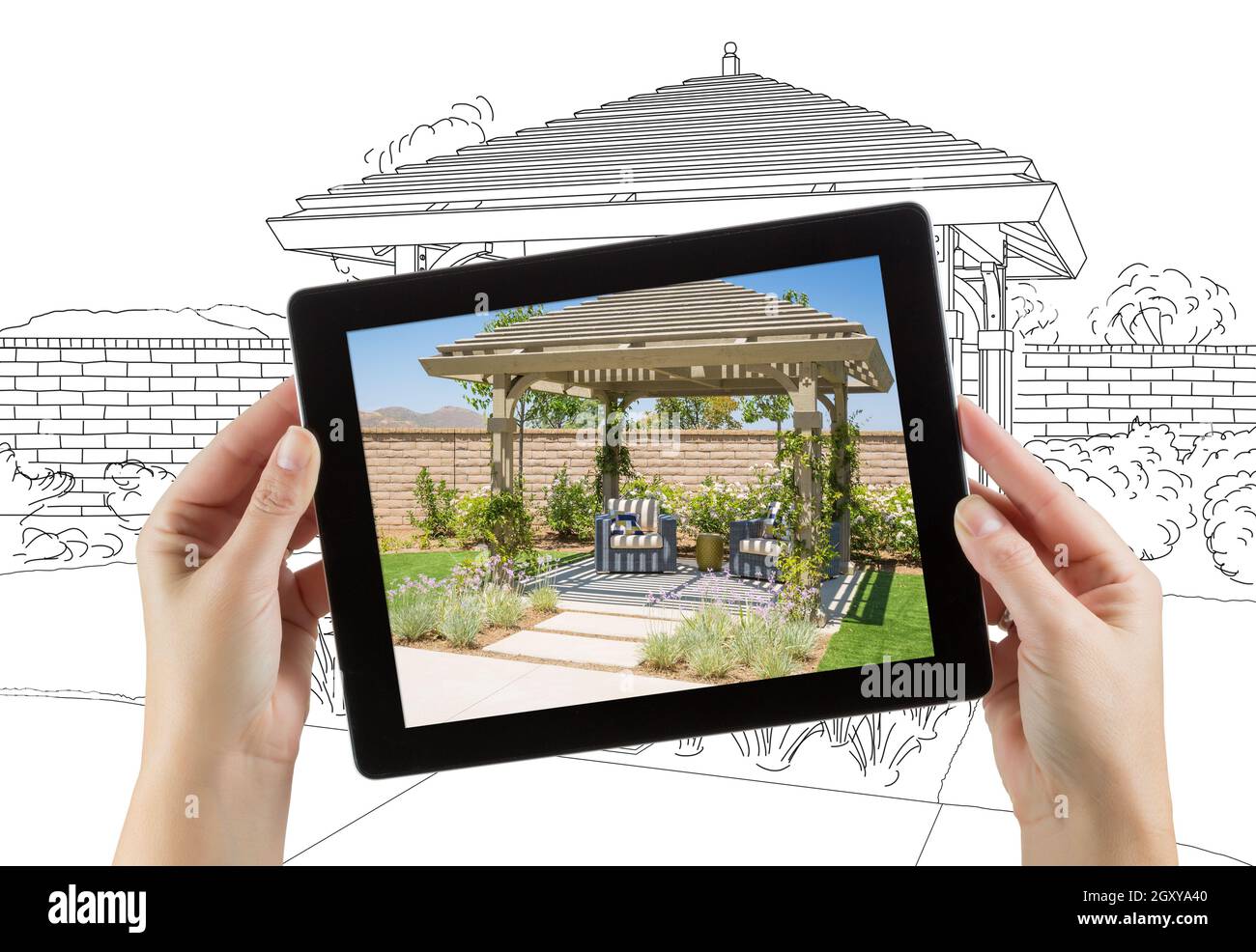 Female Hands Holding Computer Tablet with Photo of Pergola on Screen ...