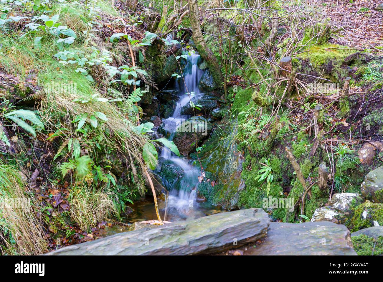small waterfall at the Sygun Copper Mine, a restored Victorian copper ...