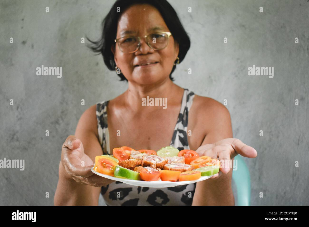 Asian woman cooking food hi-res stock photography and images - Alamy