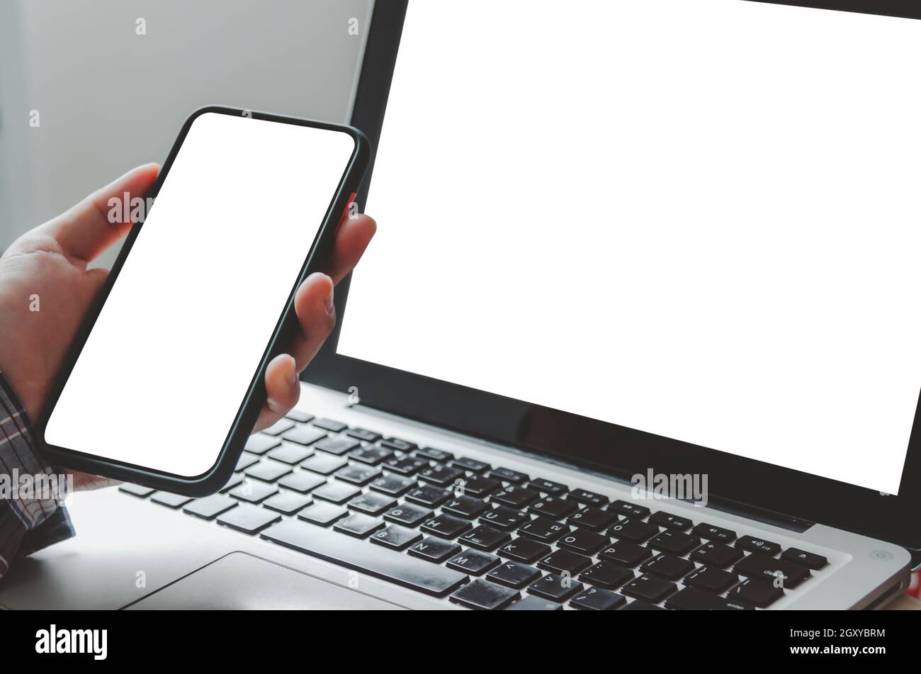 hand holding phone mockup image blank screen computer laptop for ...