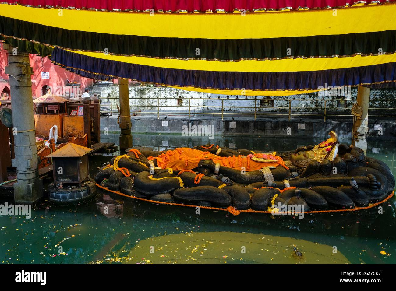 Kathmandu, Nepal - October 2021: Reclining statue of Vishnu as Narayan ...